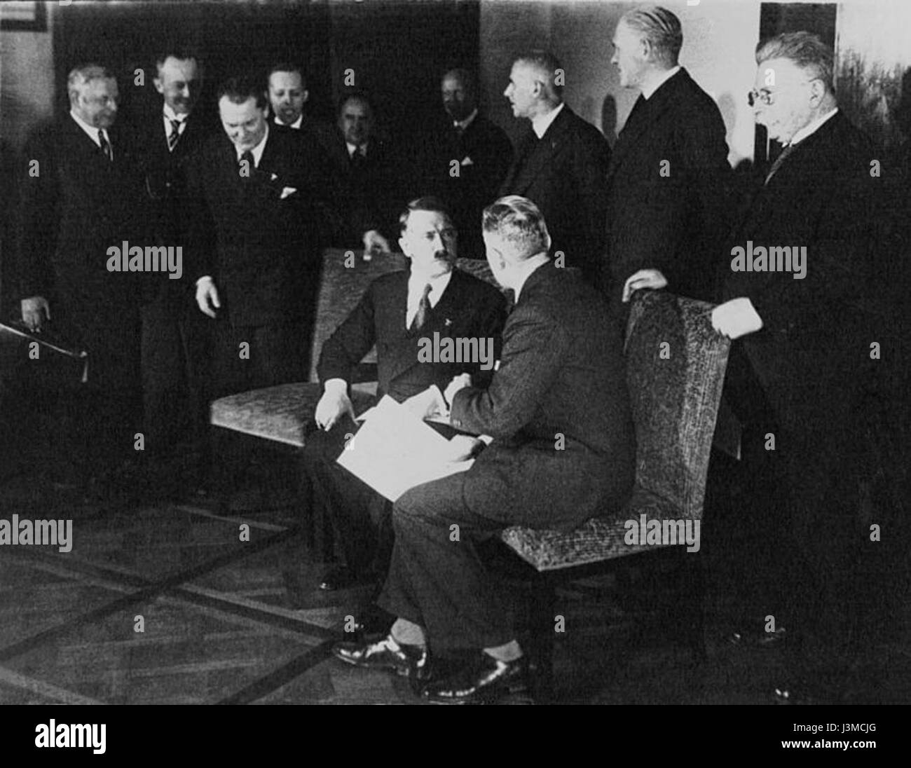 This title refers to Adolf Hitler and his government in 1933, marking ...
