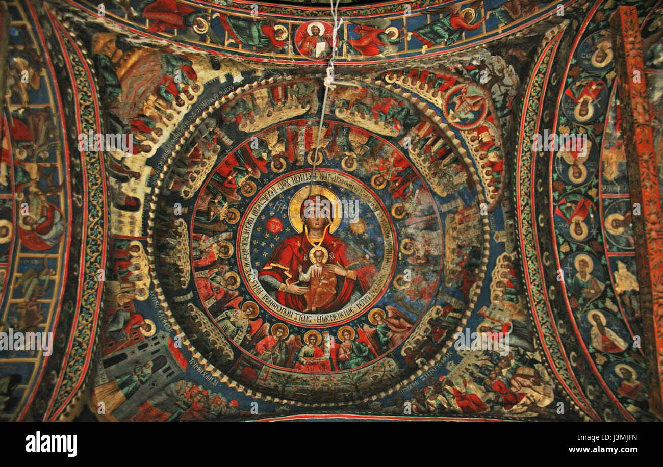 The Holy Trinity fresco at the Vythos Dolos Monastery features a ...