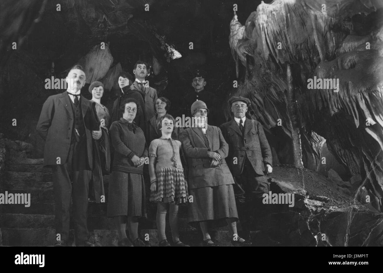An early 19th-century group photograph featuring individuals in ...