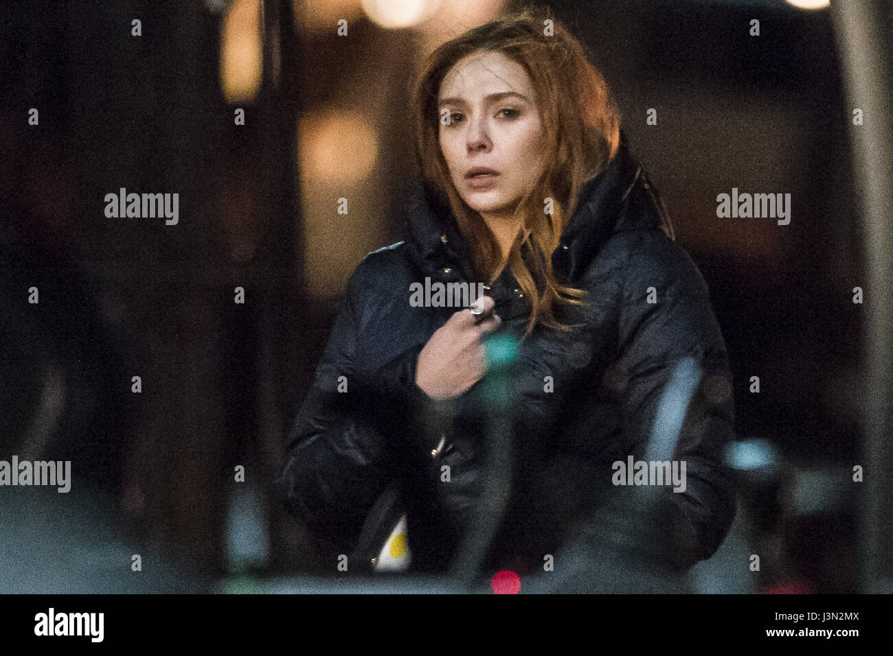Elizabeth Olsen feels the cold as she films scenes for upcoming movie ...
