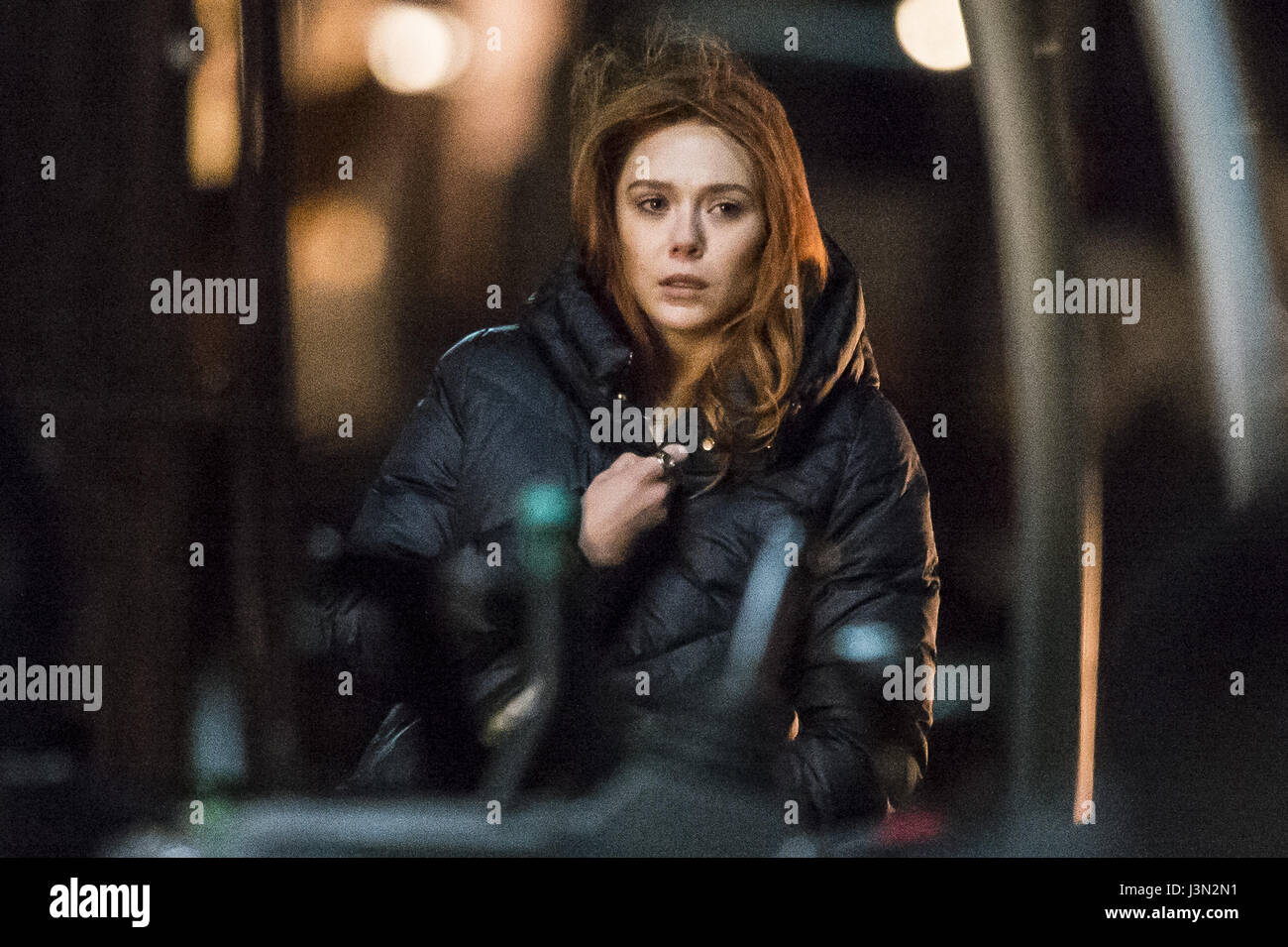 Elizabeth Olsen feels the cold as she films scenes for upcoming movie ...