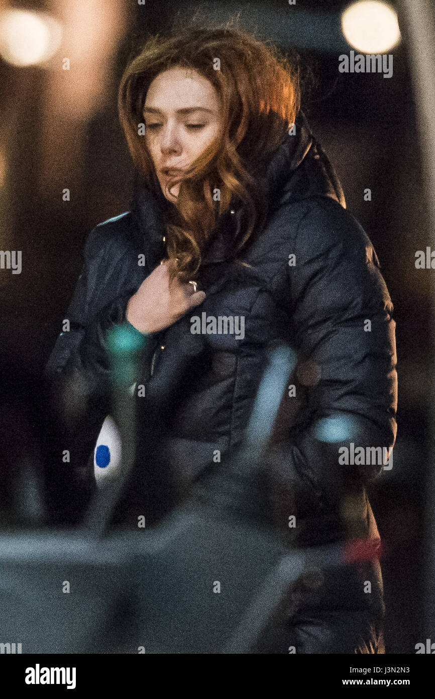 Elizabeth Olsen feels the cold as she films scenes for upcoming movie ...