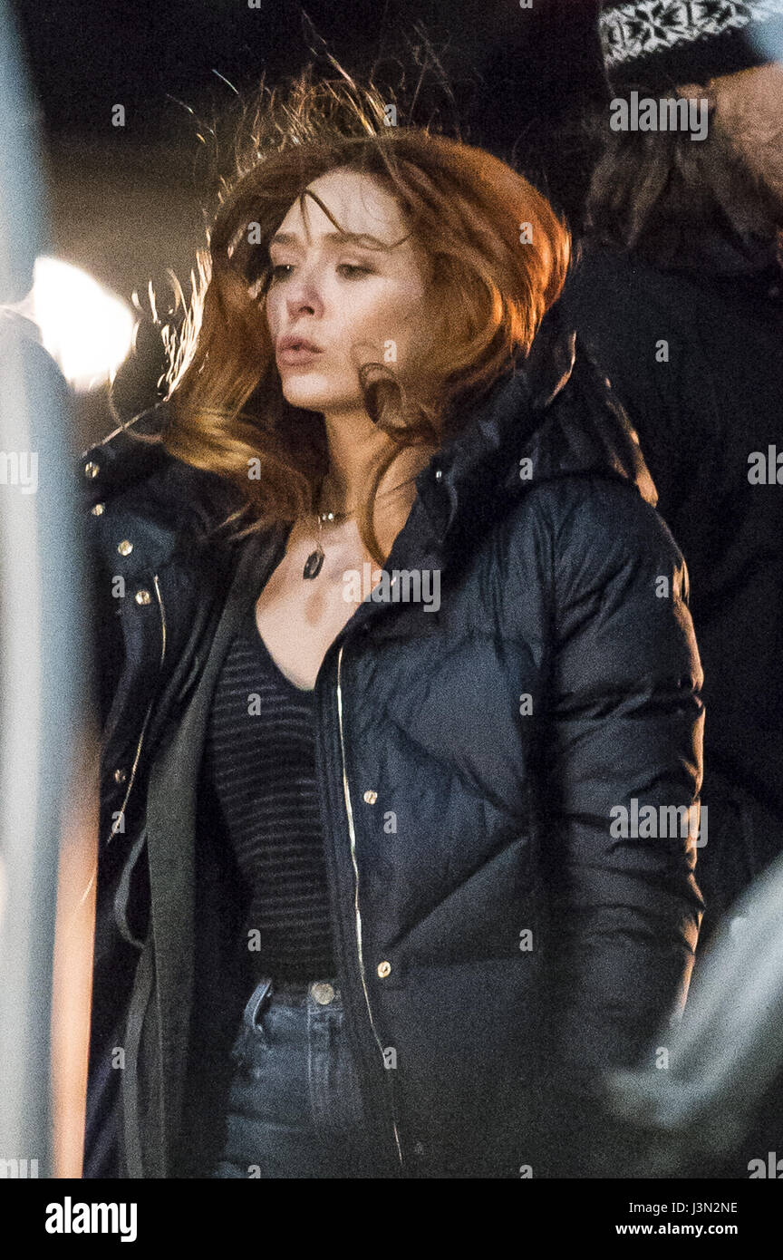 Elizabeth Olsen feels the cold as she films scenes for upcoming movie ...