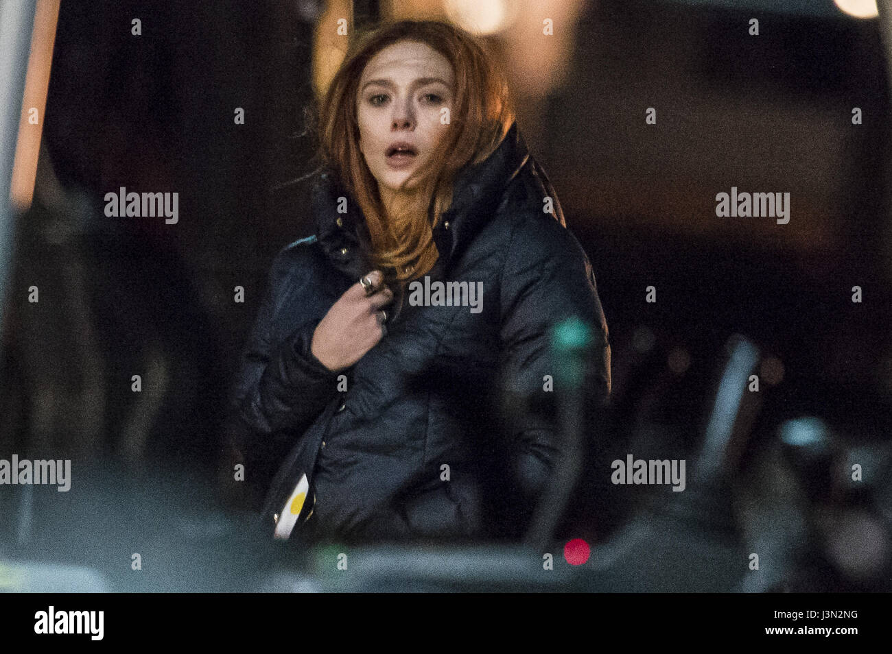 Elizabeth Olsen feels the cold as she films scenes for upcoming movie ...