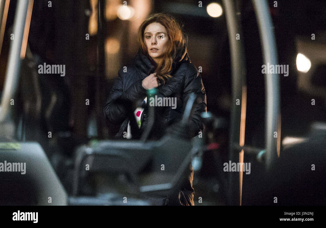 Elizabeth Olsen feels the cold as she films scenes for upcoming movie ...