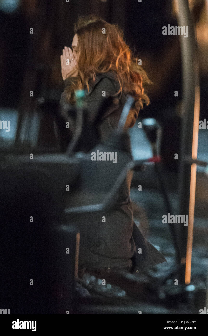 Elizabeth Olsen feels the cold as she films scenes for upcoming movie ...