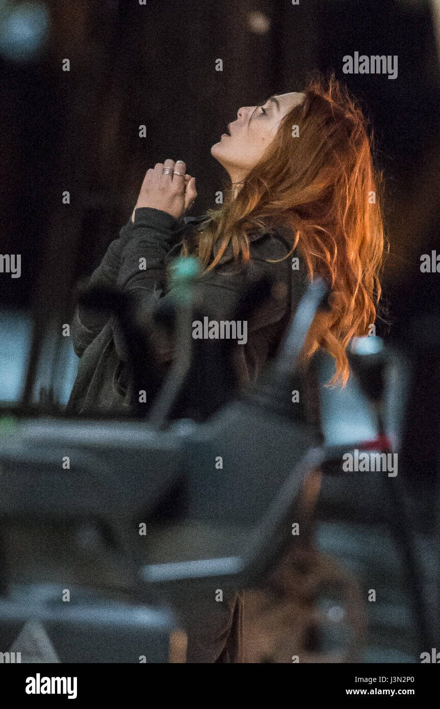 Elizabeth Olsen feels the cold as she films scenes for upcoming movie ...