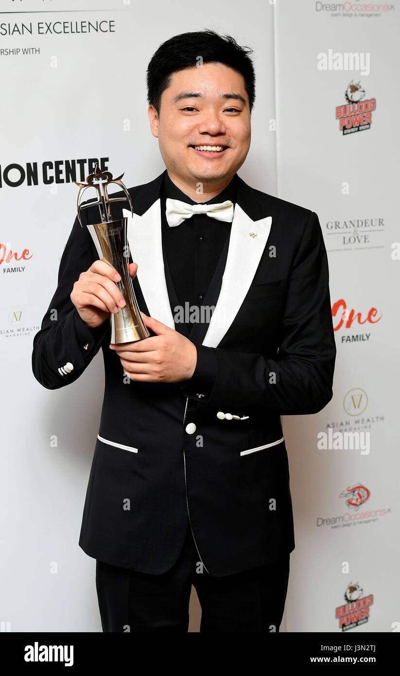 Ding Junhui with the Outstanding Acheivement in Sport award at the ...
