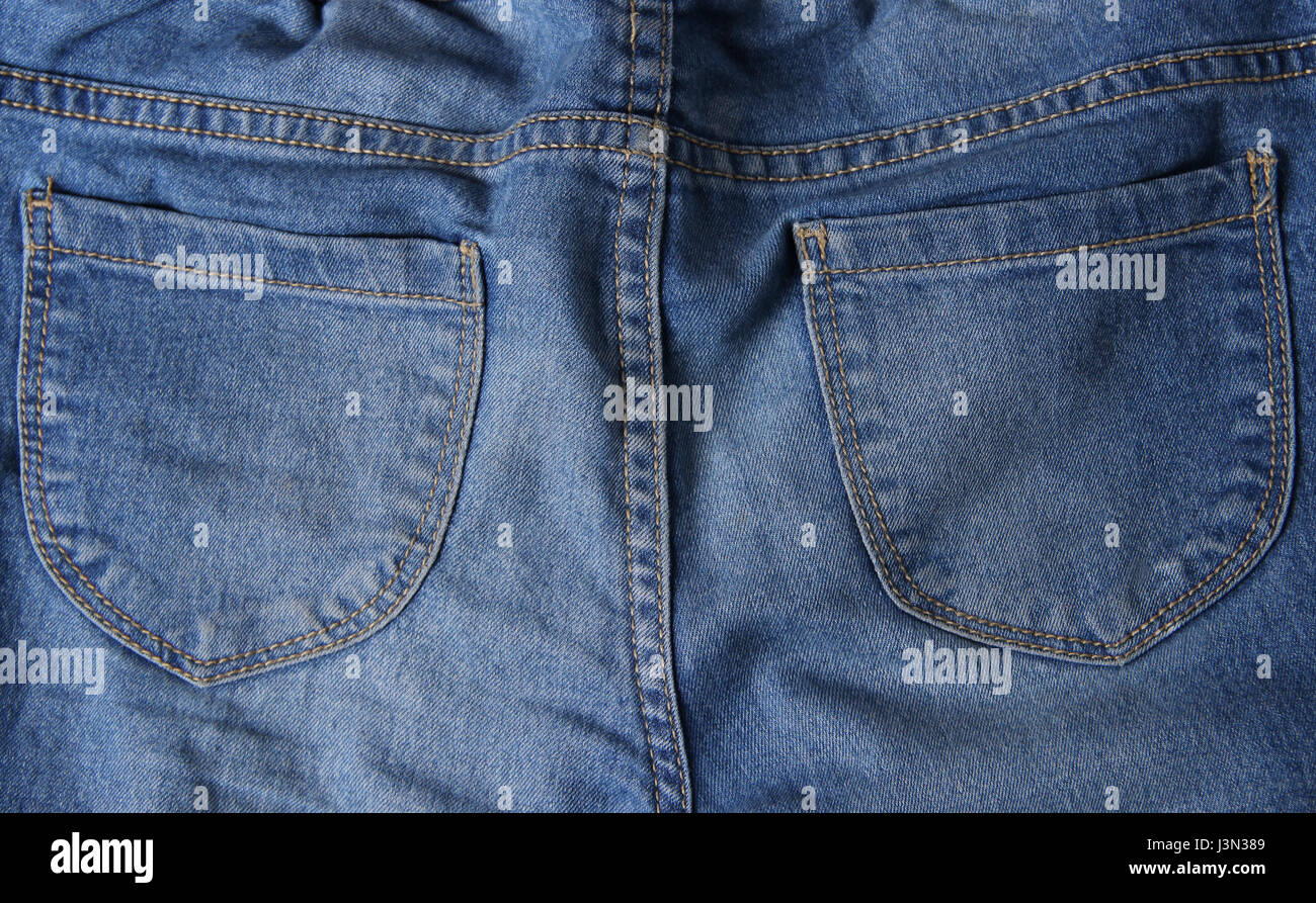 Back pockets of blue jeans Stock Photo - Alamy