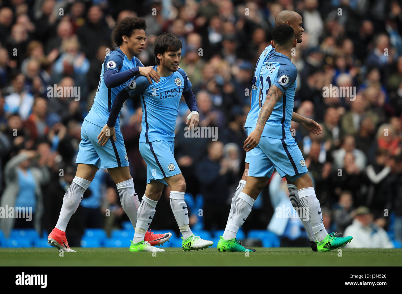 Manchester City's David Silva celebrates scoring his side's first goal ...