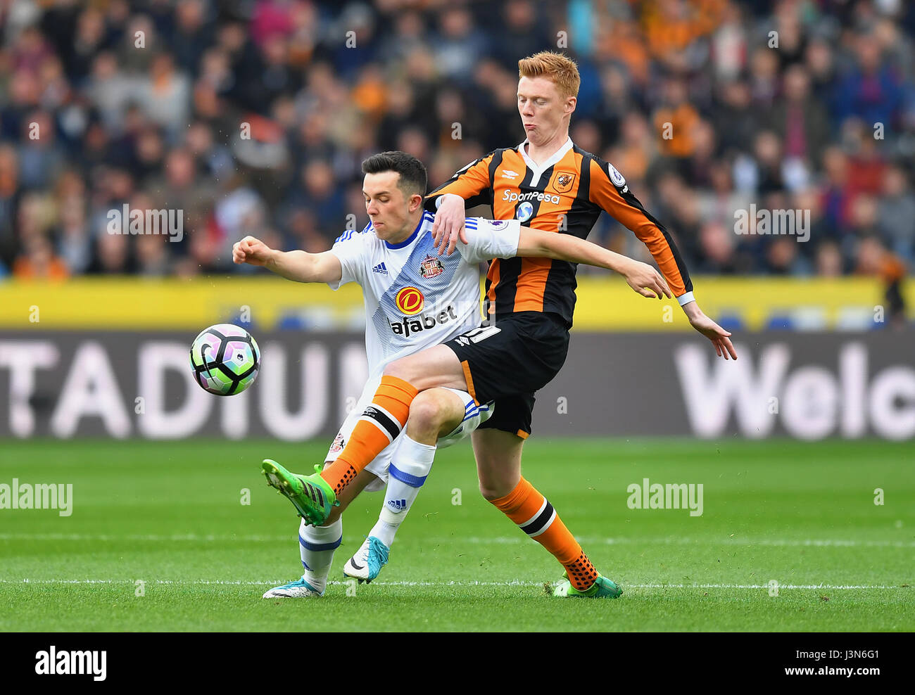 Sunderland's George Honeyman (left) and Hull City's Sam Clucas battle ...