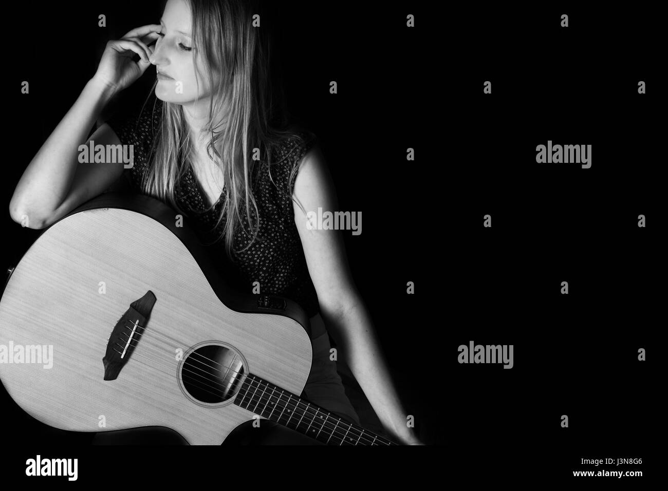 Girl playing guitar Black and White Stock Photos & Images - Alamy