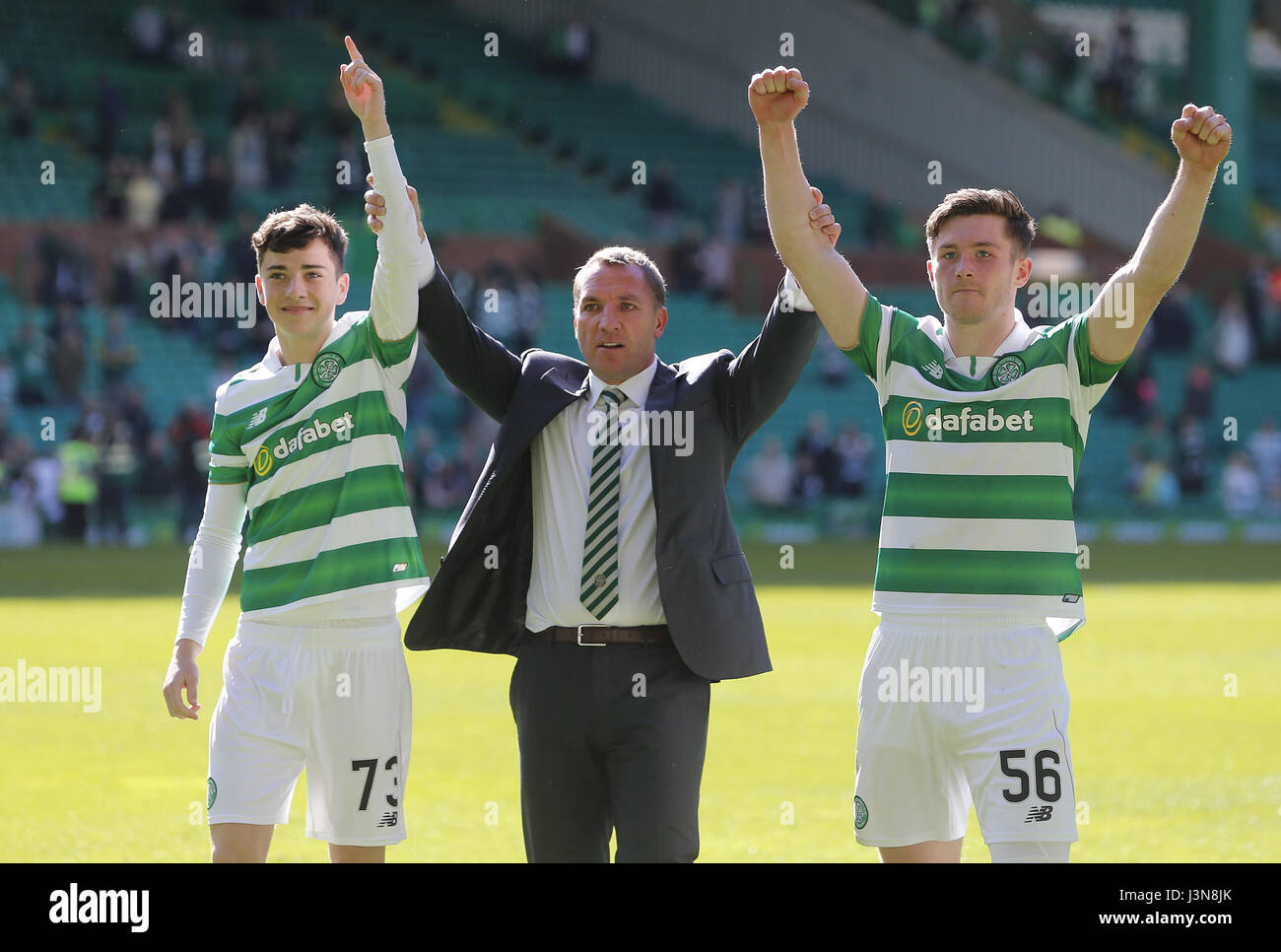 Celtic manager Brendan Rodgers with Michael Johnston (left) and Anthony ...
