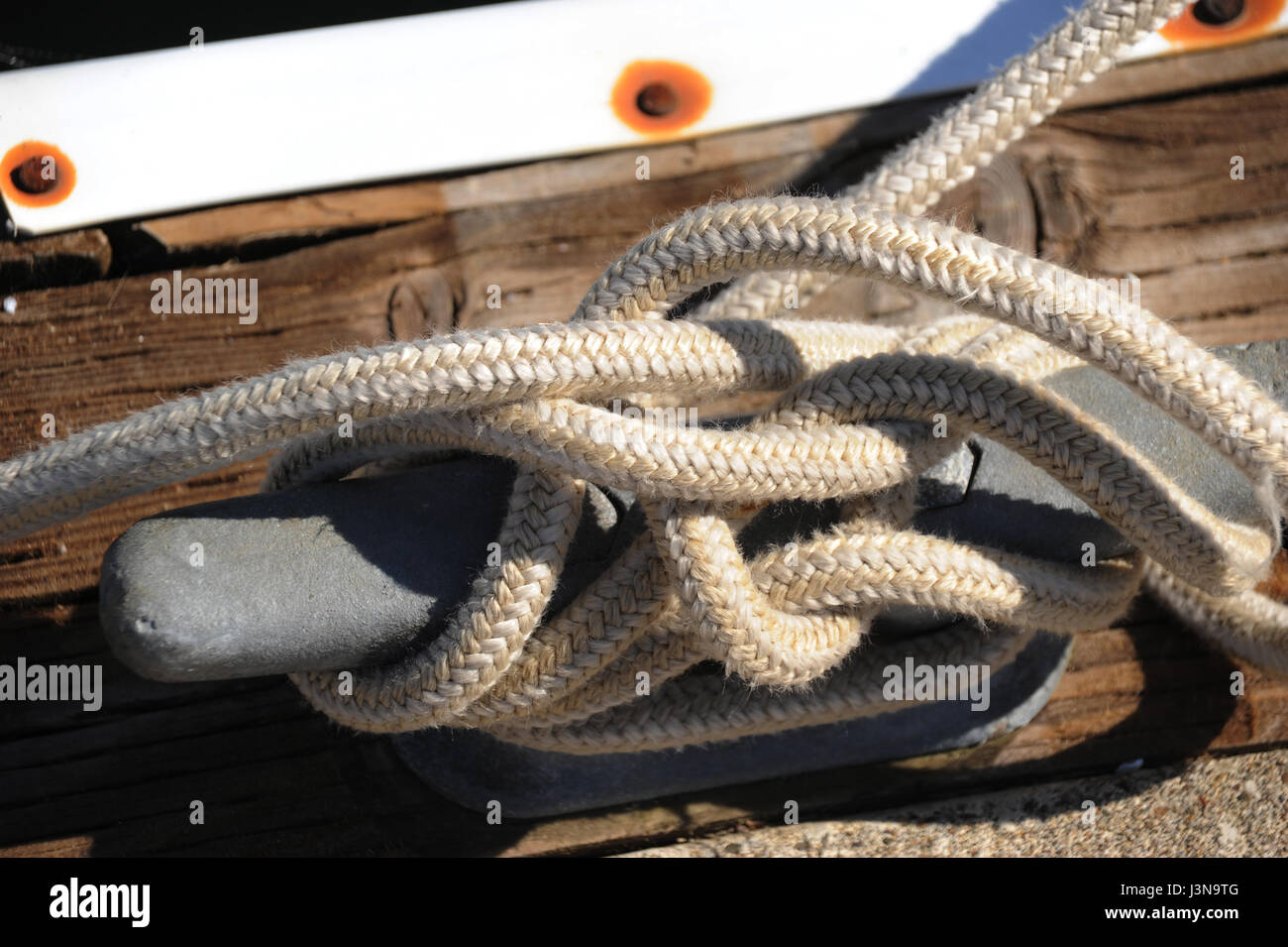 Rope boat ties on a Florence Oregon waterfront scene Stock Photo - Alamy