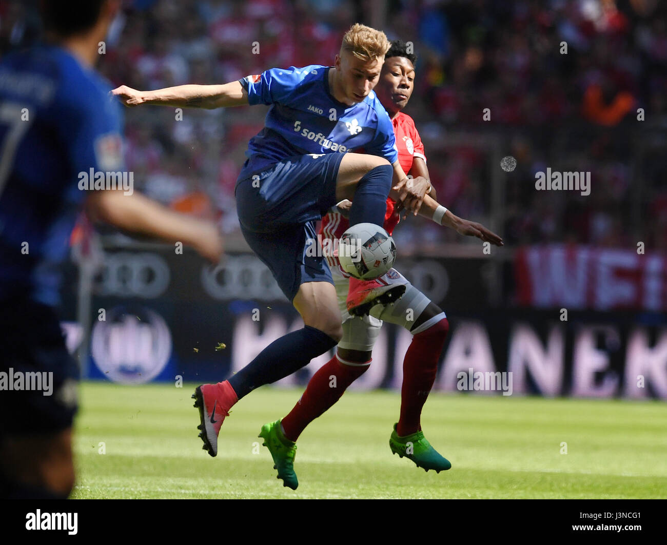 Munich, Germany. 06th May, 2017. Darmstadt's Felix Platte (L) and David ...