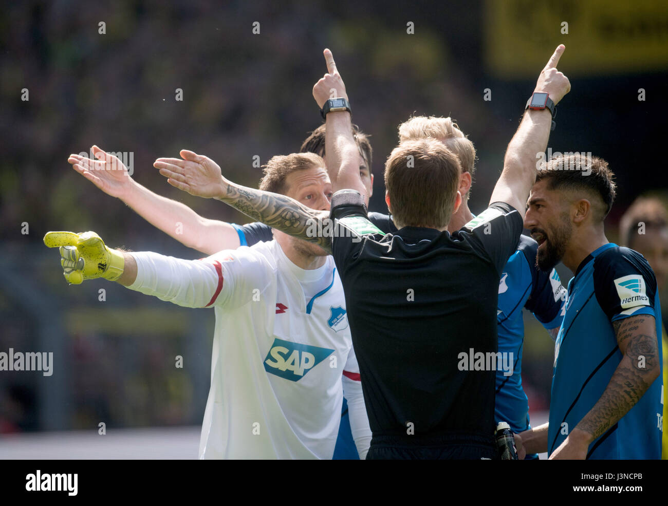 Players Arguing With Referee High Resolution Stock Photography and ...