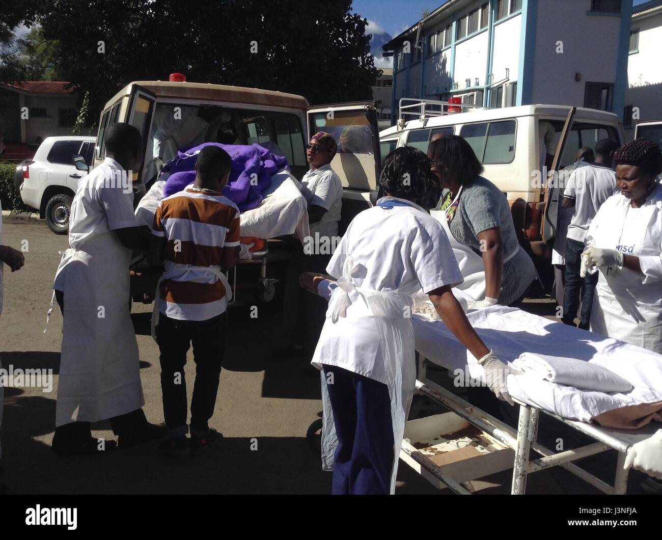 Dar Es Salaam. 6th May, 2017. People injured in a school bus crash are ...