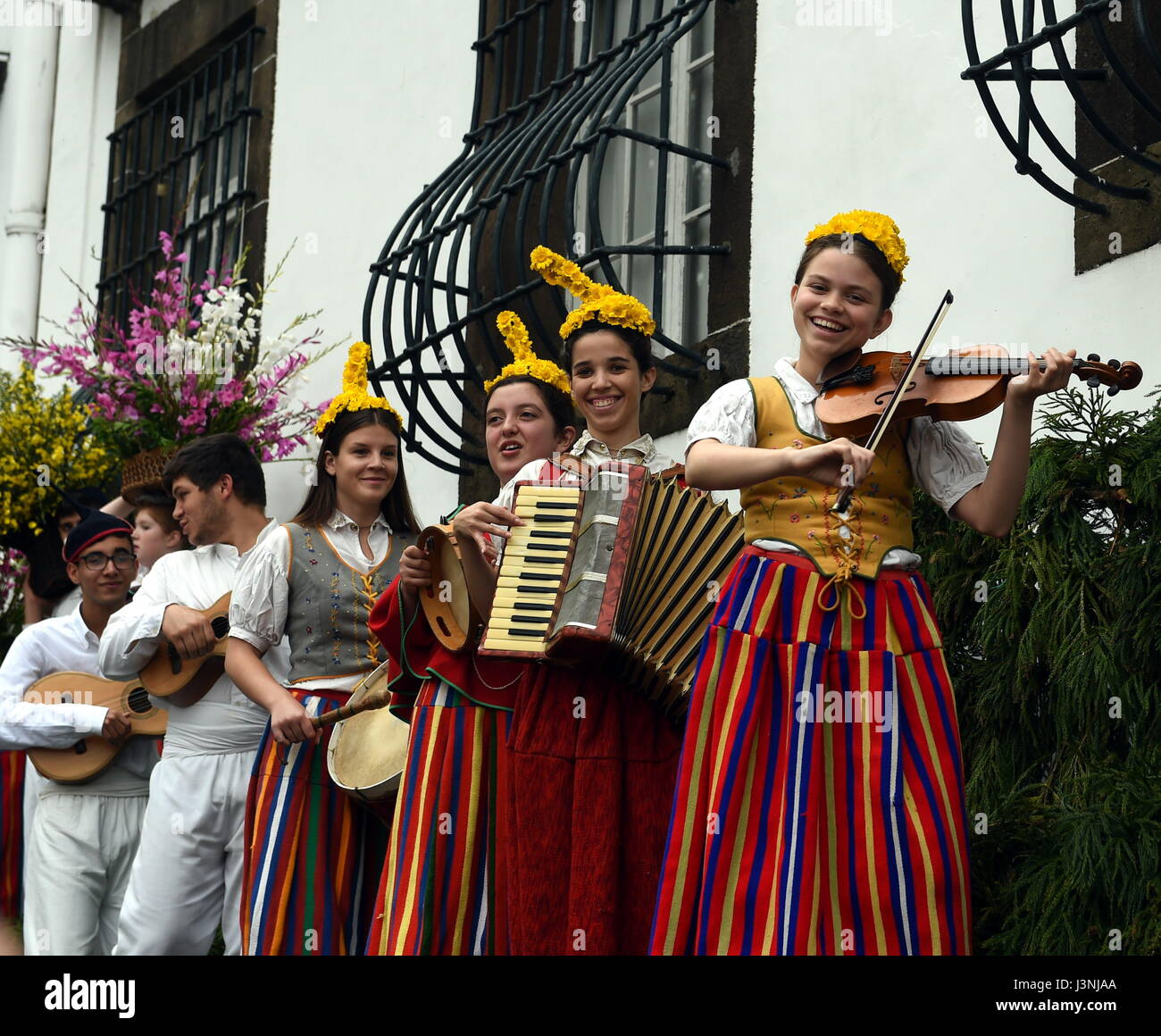 Funchal, Portugal. 7th May, 2017. People perform musical instruments ...