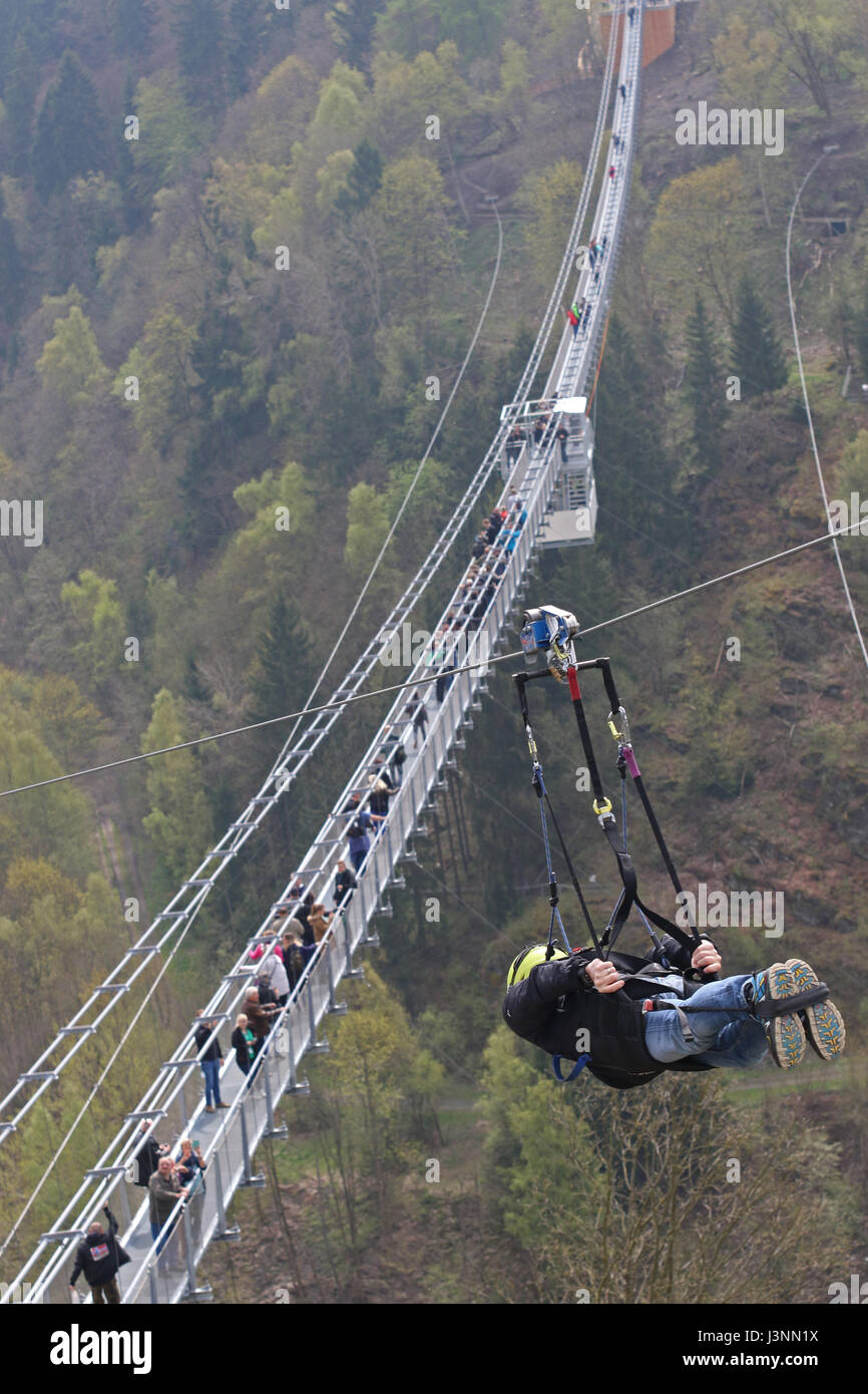 Ruebeland, Germany. 7th May, 2017. A man uses a ropeway across the ...