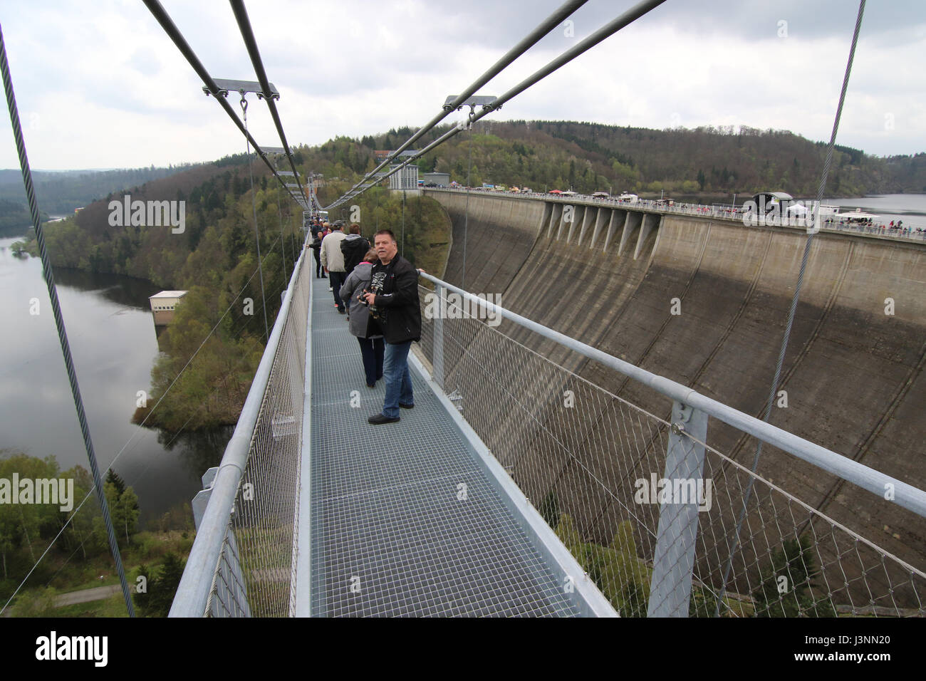 Ruebeland, Germany. 7th May, 2017. People walk across the newly opened ...