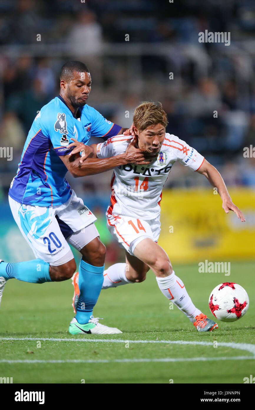 (L to R) Calvin Ray Jong A Pin (Yokohama FC), Kosuke Shirai (Ehime FC ...