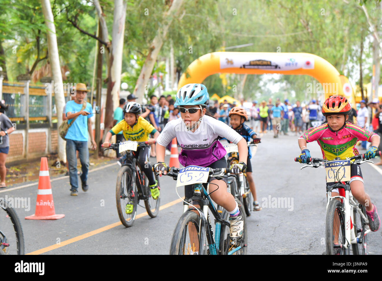 Singburi, Thailand. 7th May 2017. Biker riding a mountain bike at ...
