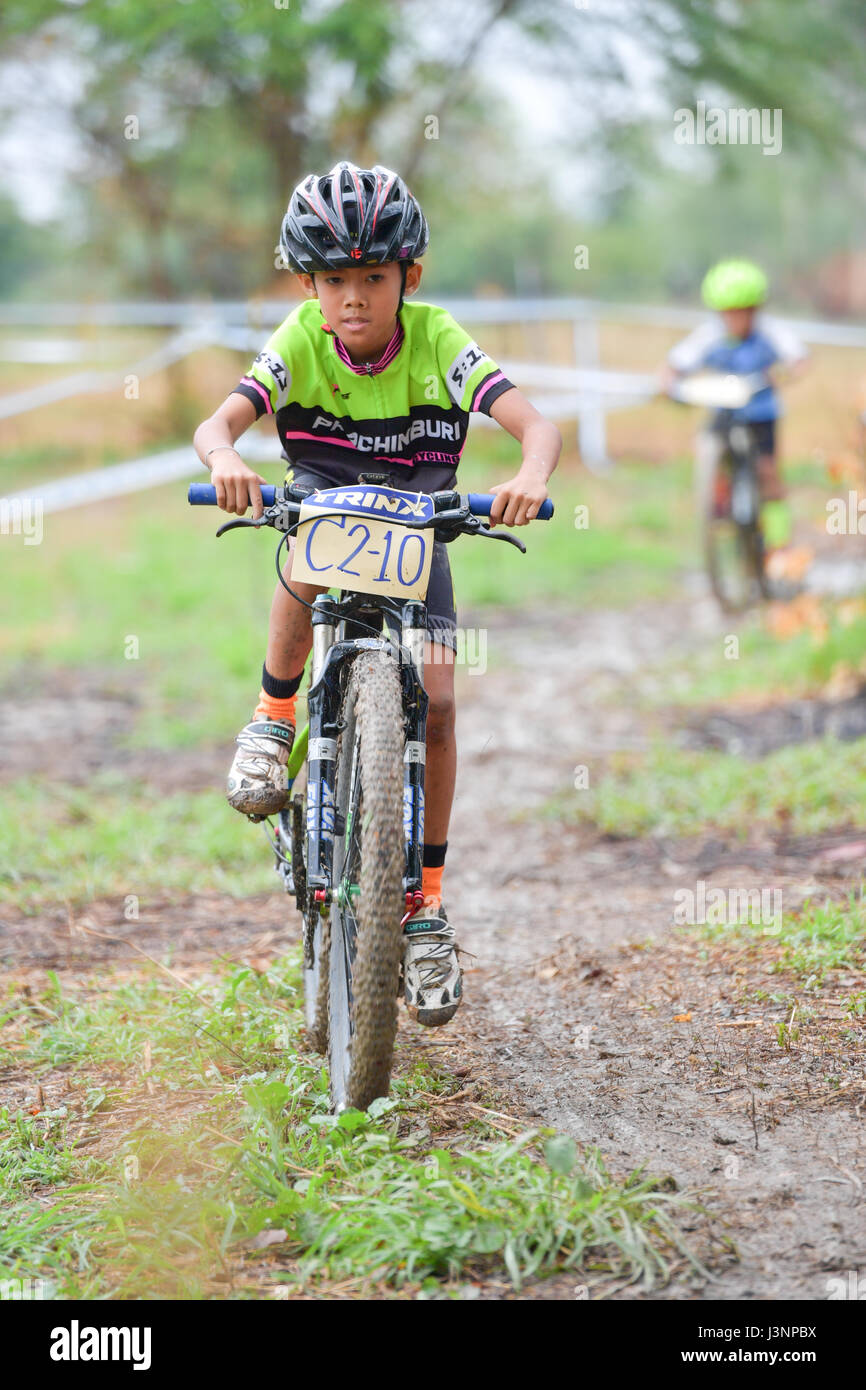 Singburi, Thailand. 7th May 2017. Biker riding a mountain bike at ...