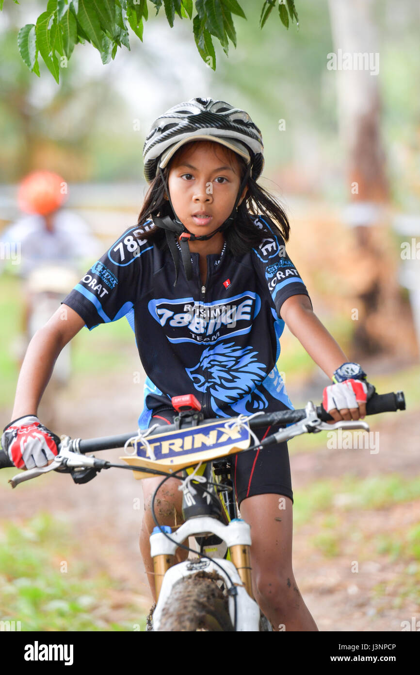 Singburi, Thailand. 7th May 2017. Biker riding a mountain bike at ...