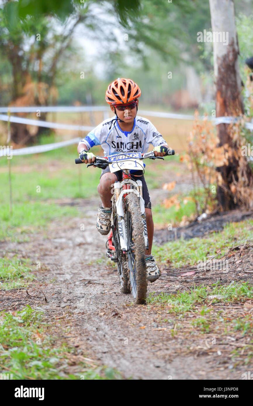 Singburi, Thailand. 7th May 2017. Biker riding a mountain bike at ...