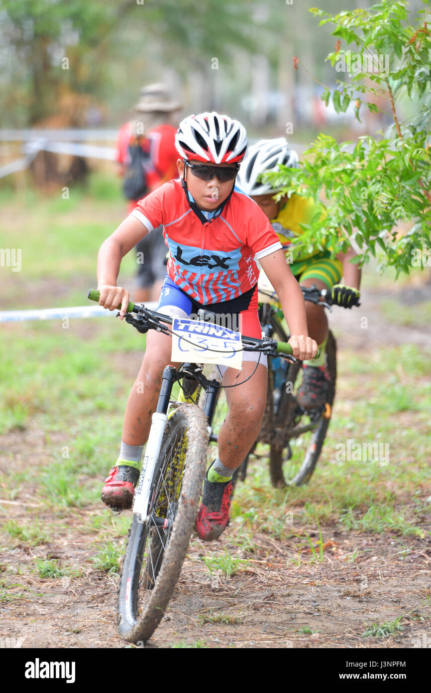 Singburi, Thailand. 7th May 2017. Biker riding a mountain bike at ...