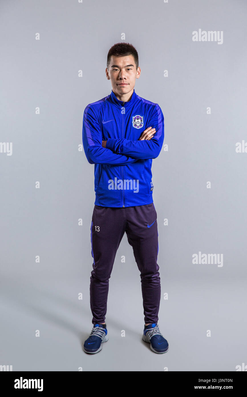 Portrait of Chinese soccer player Wang Qiuming of Tianjin TEDA F.C. for ...