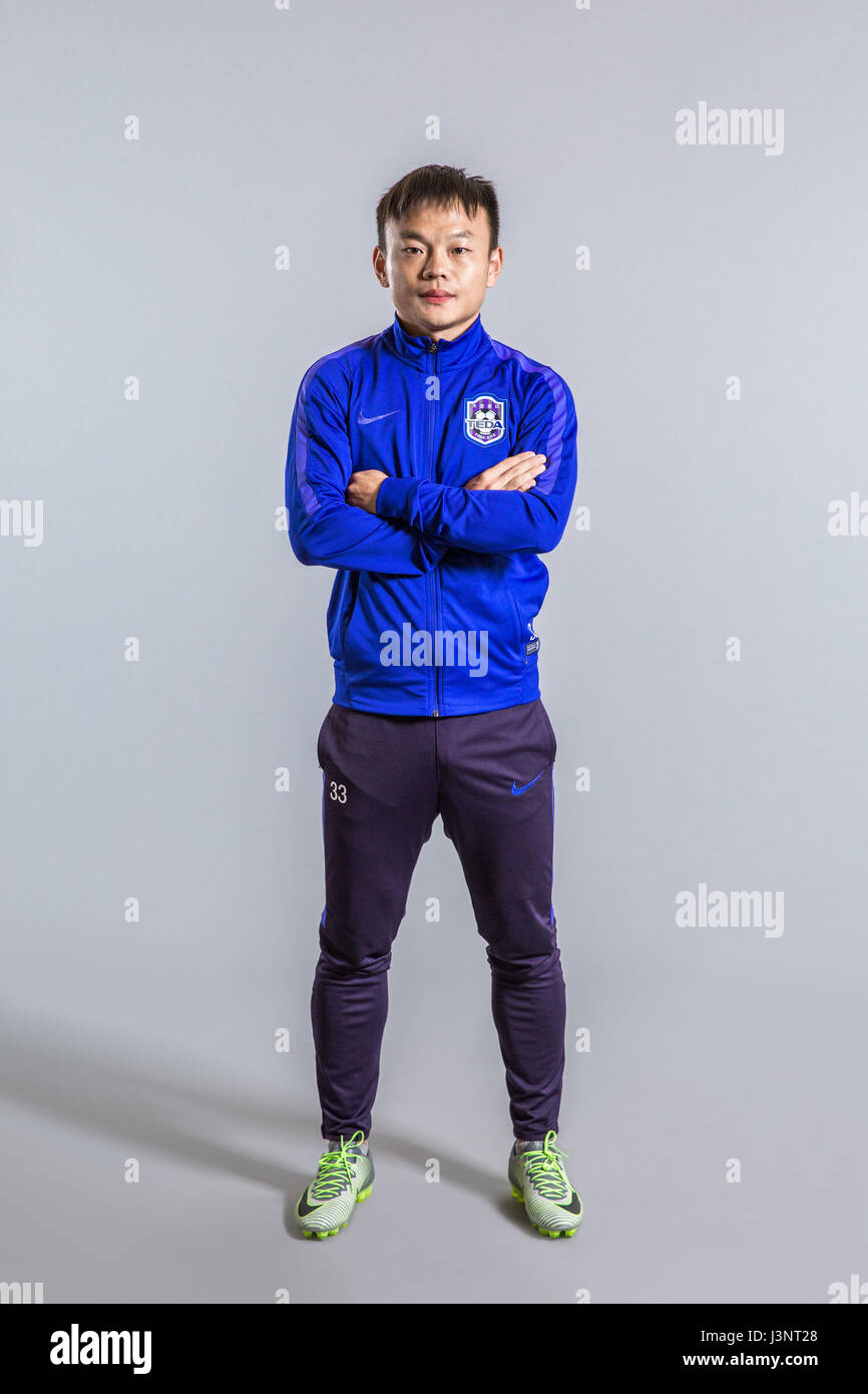 Portrait of Chinese soccer player Zhou Tong of Tianjin TEDA F.C. for ...