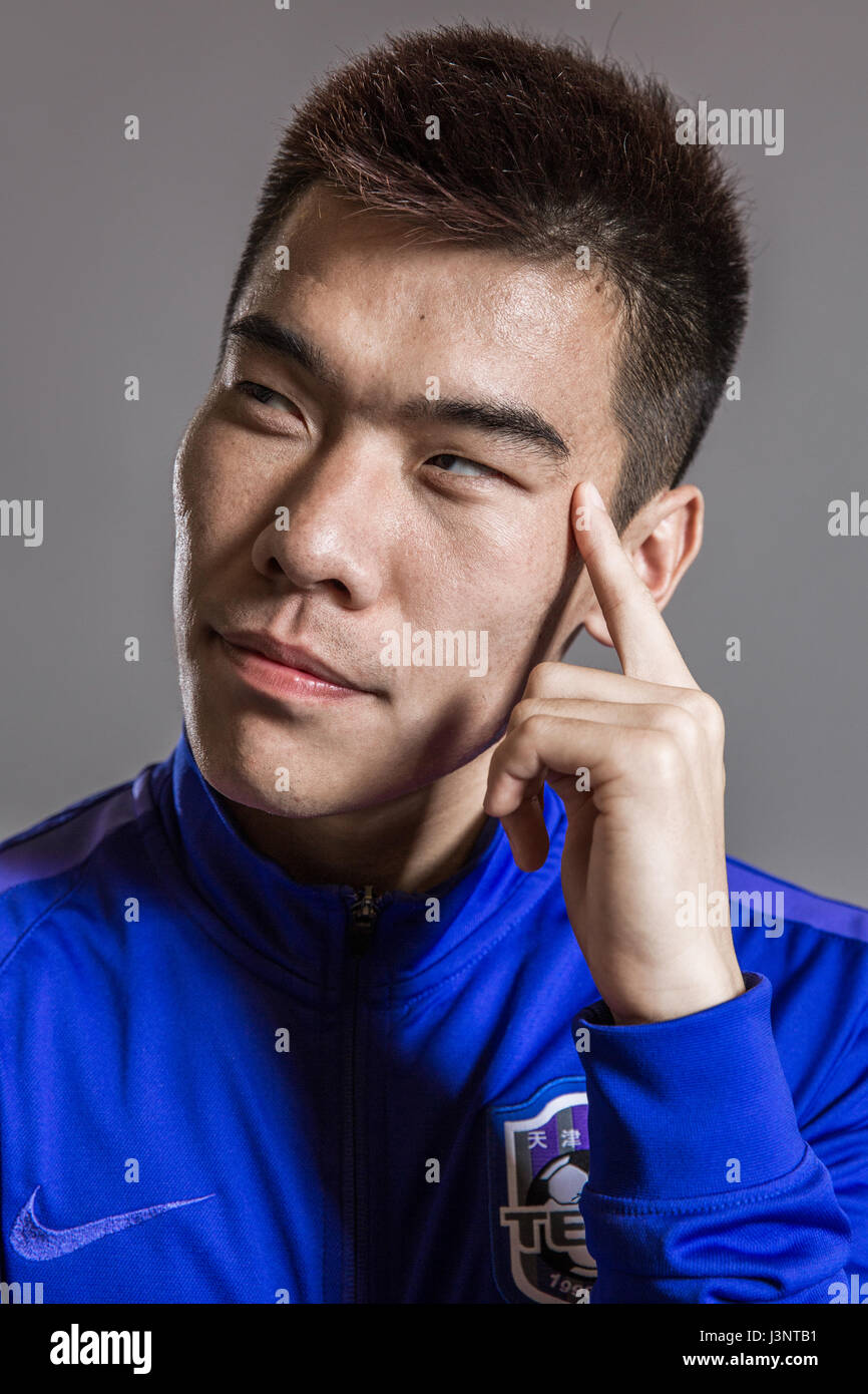 Portrait of Chinese soccer player Wang Qiuming of Tianjin TEDA F.C. for ...