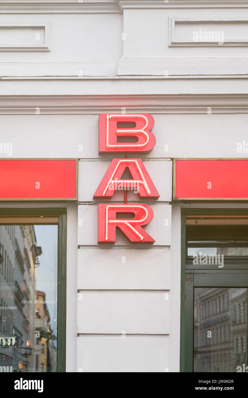 red neon bar sign at a pub Stock Photo - Alamy