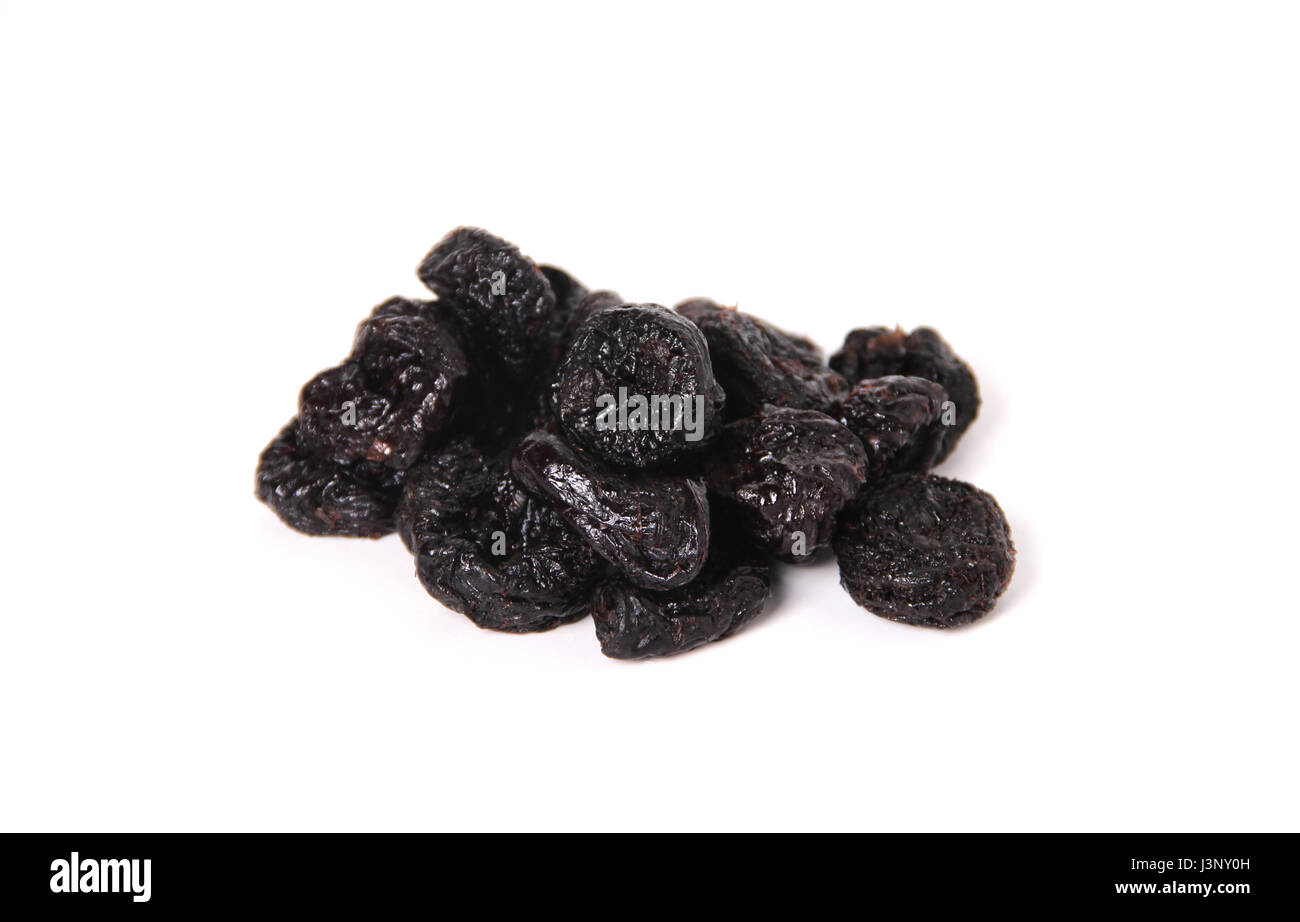 Dried prunes close up Cut Out Stock Images & Pictures - Alamy