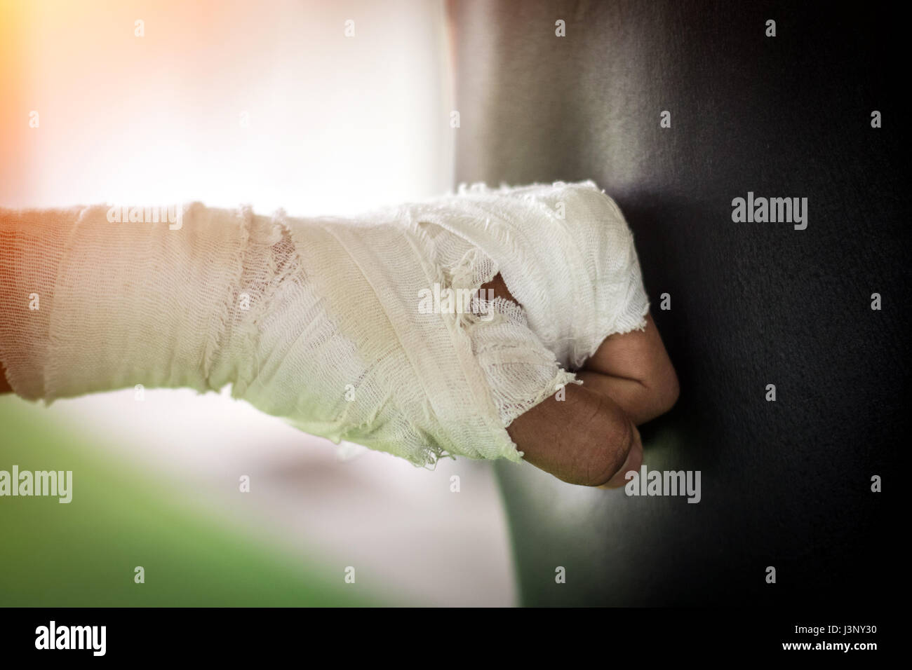Hand of boxer and punching bag Stock Photo - Alamy