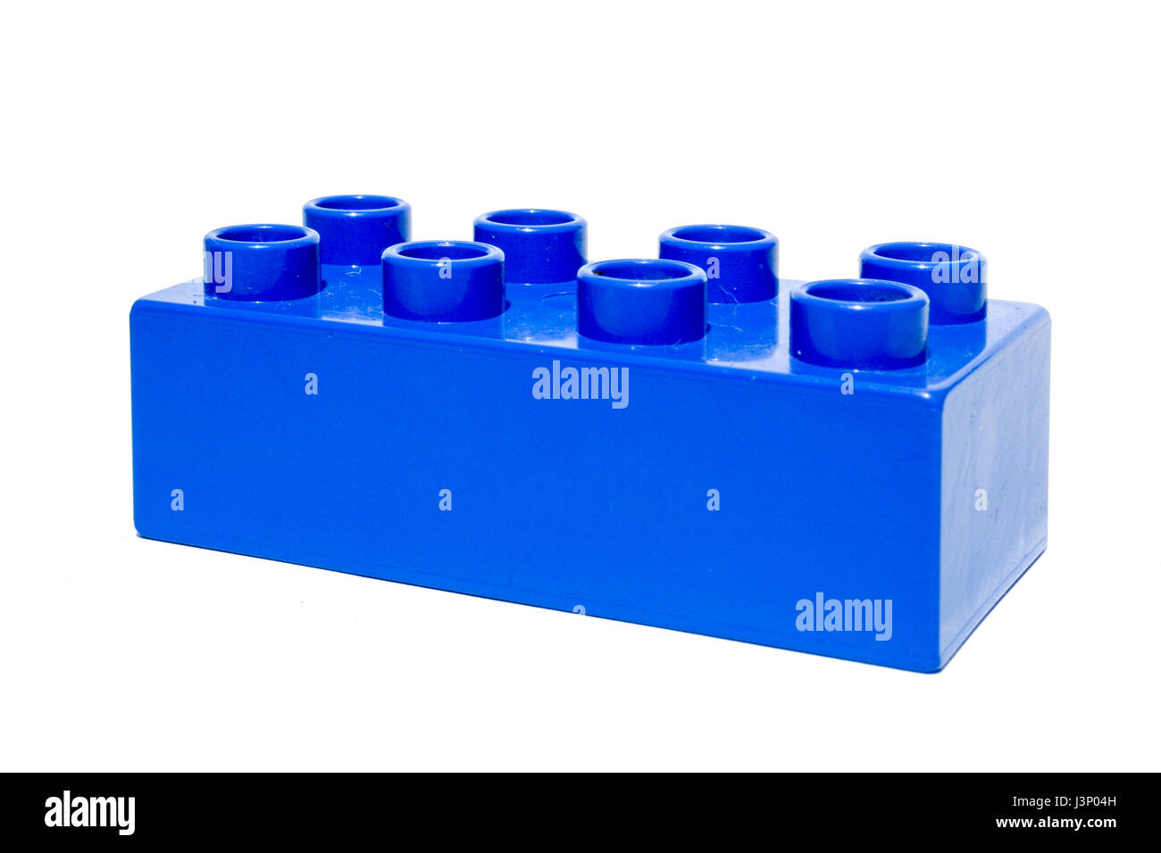 Children's coloured plastic toy building blocks isolated on a white ...