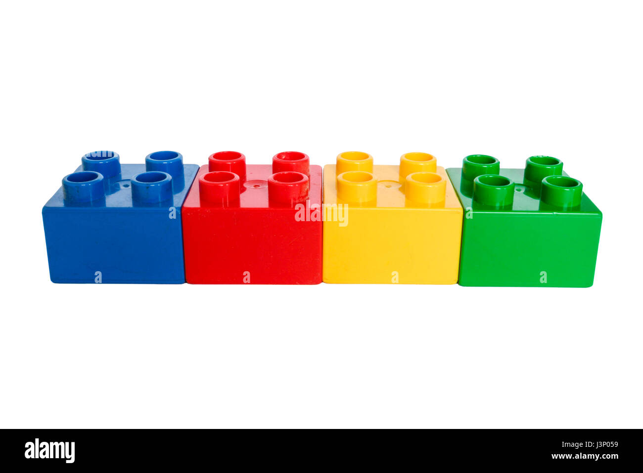 Children's coloured plastic toy building blocks isolated on a white ...