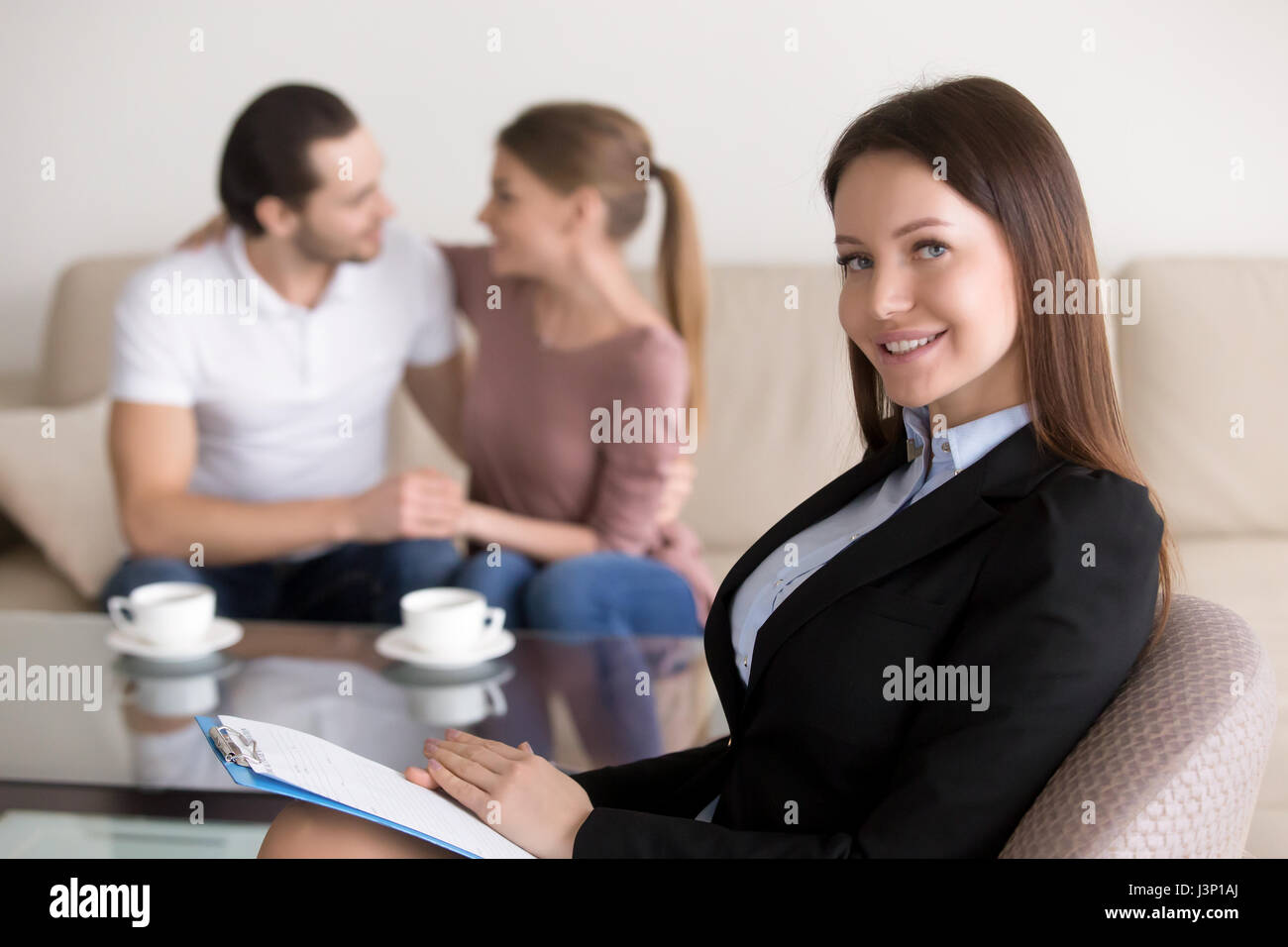 Beautiful smiling female psychologist or consultant and happy em Stock ...