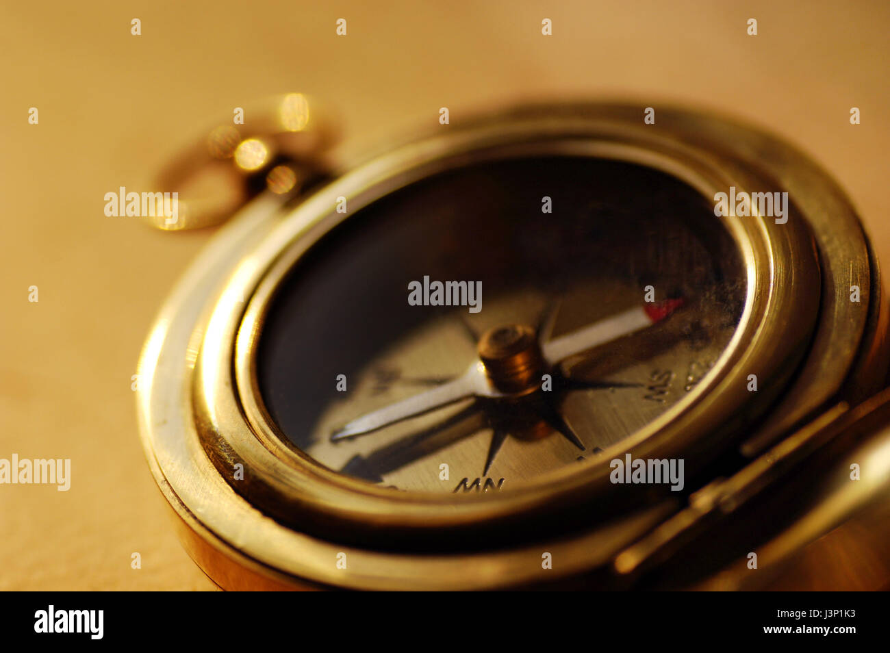 close up of a vintage brass compass Stock Photo - Alamy