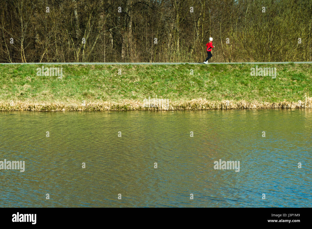 Female runner river hi-res stock photography and images - Alamy