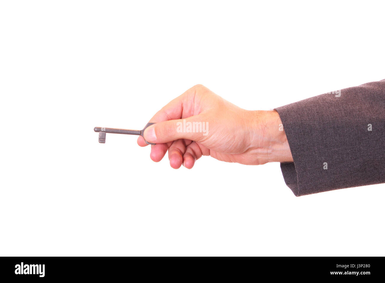 Hand with key Stock Photo - Alamy
