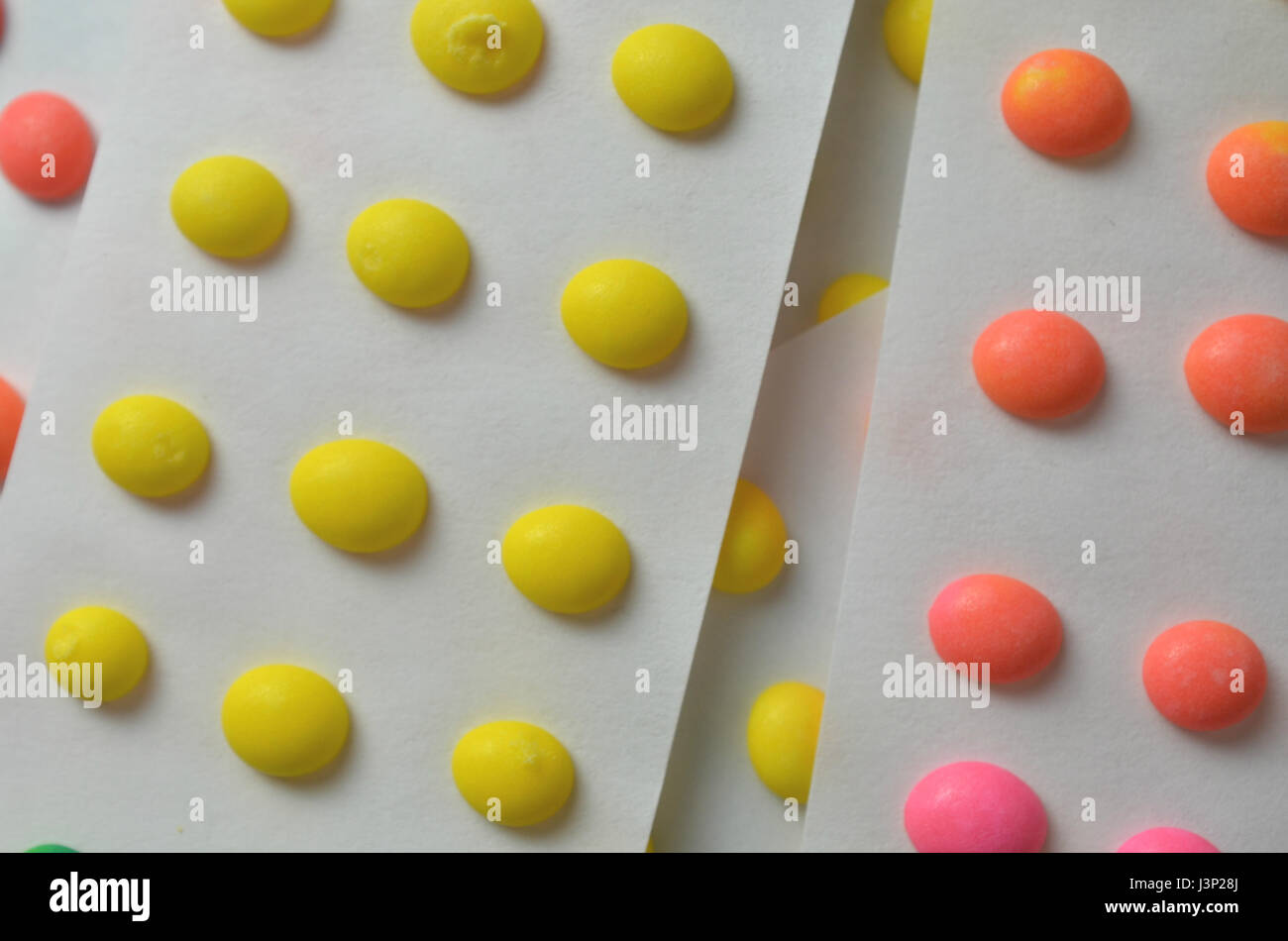 old fashioned button candy Stock Photo - Alamy