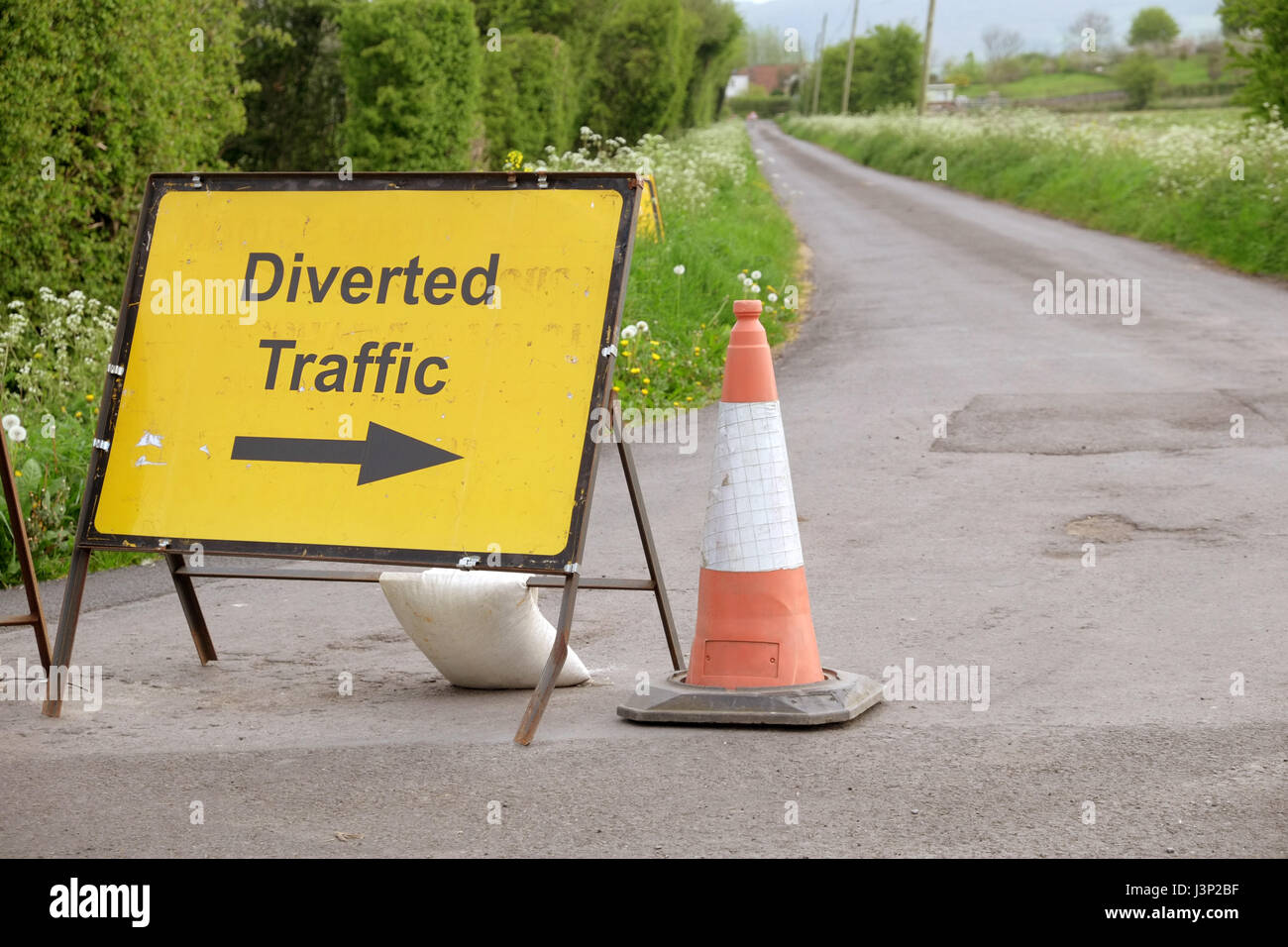 22nd April 2017 - British Road highway signs for Road closed ahead and ...
