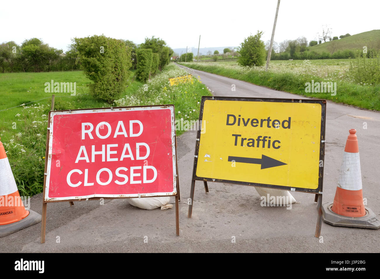 22nd April 2017 - British Road highway signs for Road closed ahead and ...