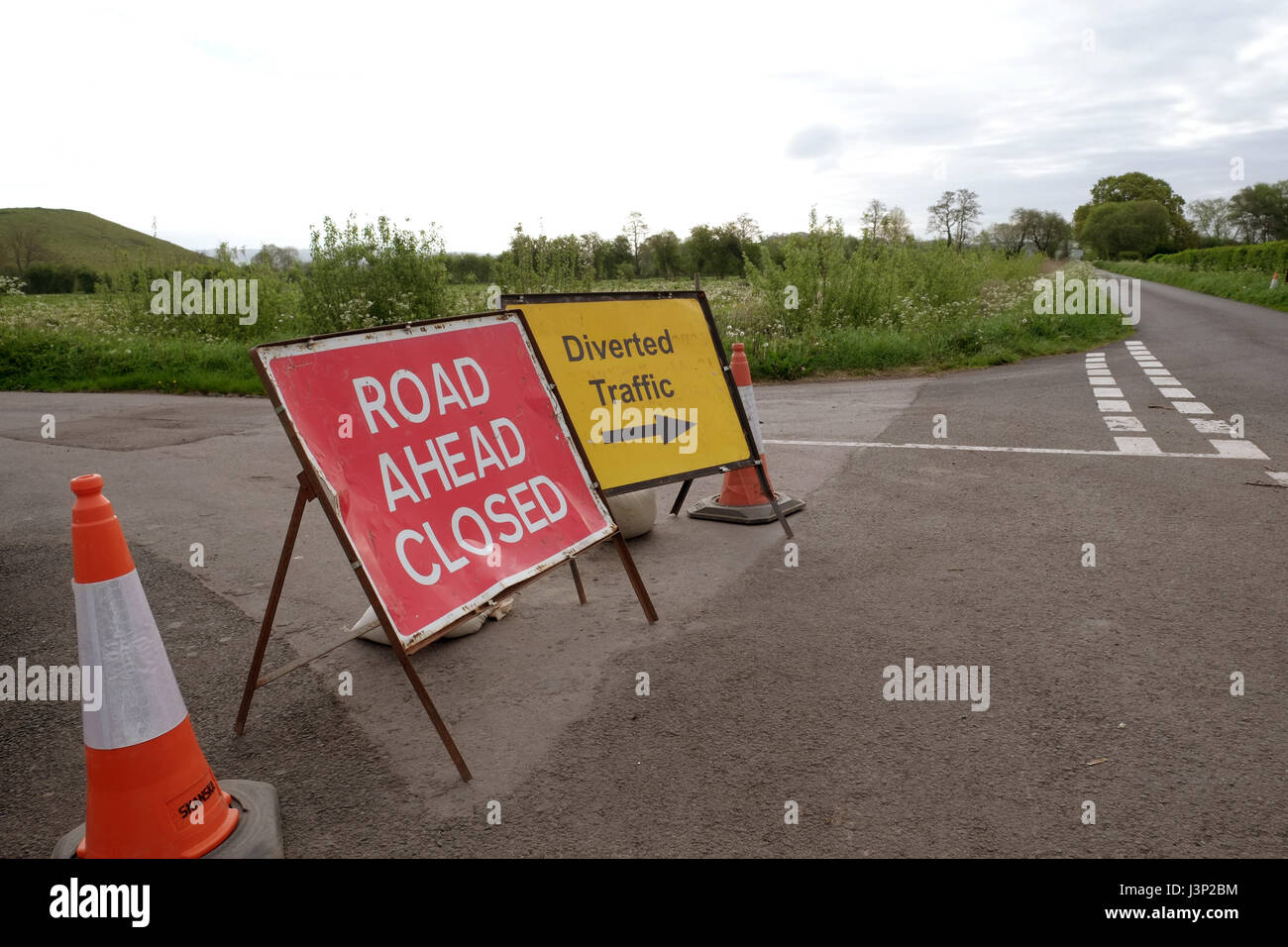22nd April 2017 - British Road highway signs for Road closed ahead and ...
