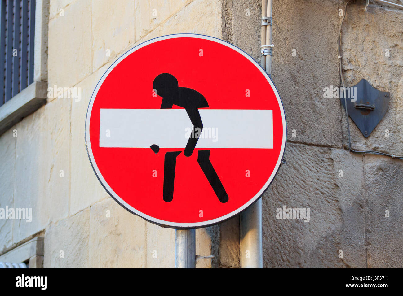 Road sign with a man that stole the signal, street art, metropolitan ...