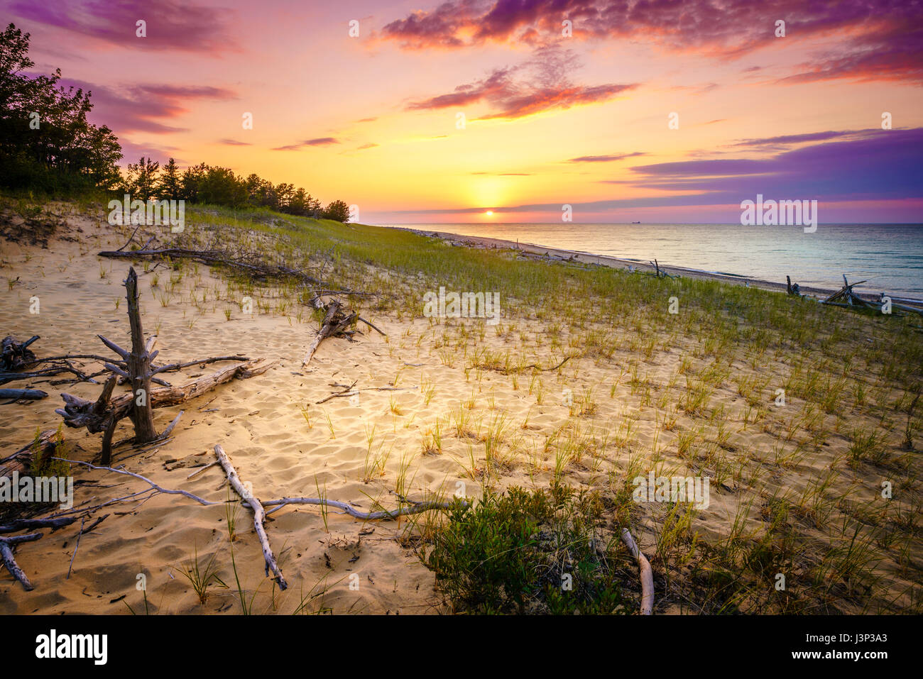 Sunset on the beach of Lake Superior in Whitefish Point, Michigan ...