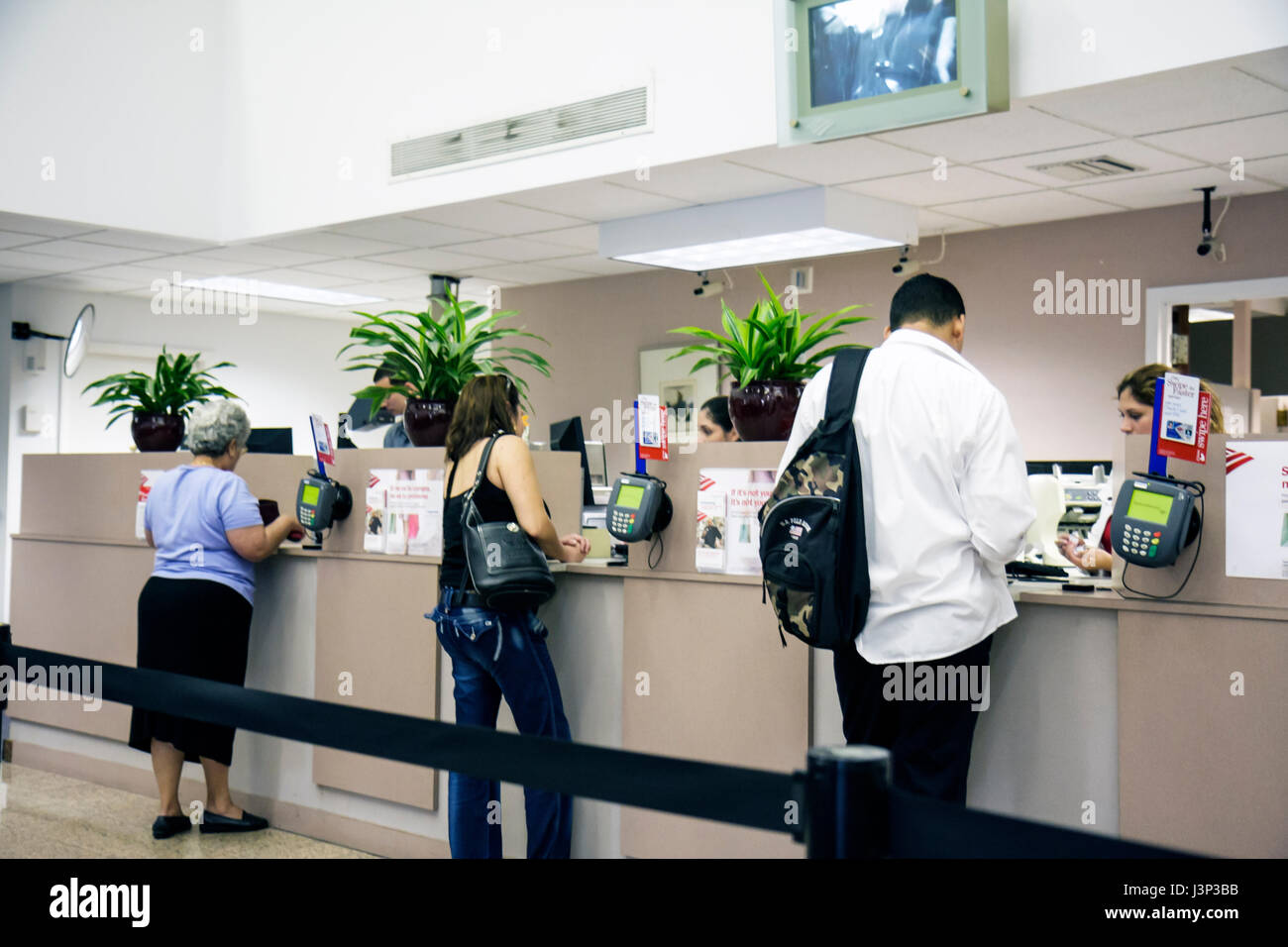 Bank Teller High Resolution Stock Photography and Images - Alamy