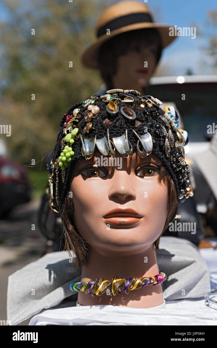 Shop window doll head with head decoration at a flea market Stock Photo ...